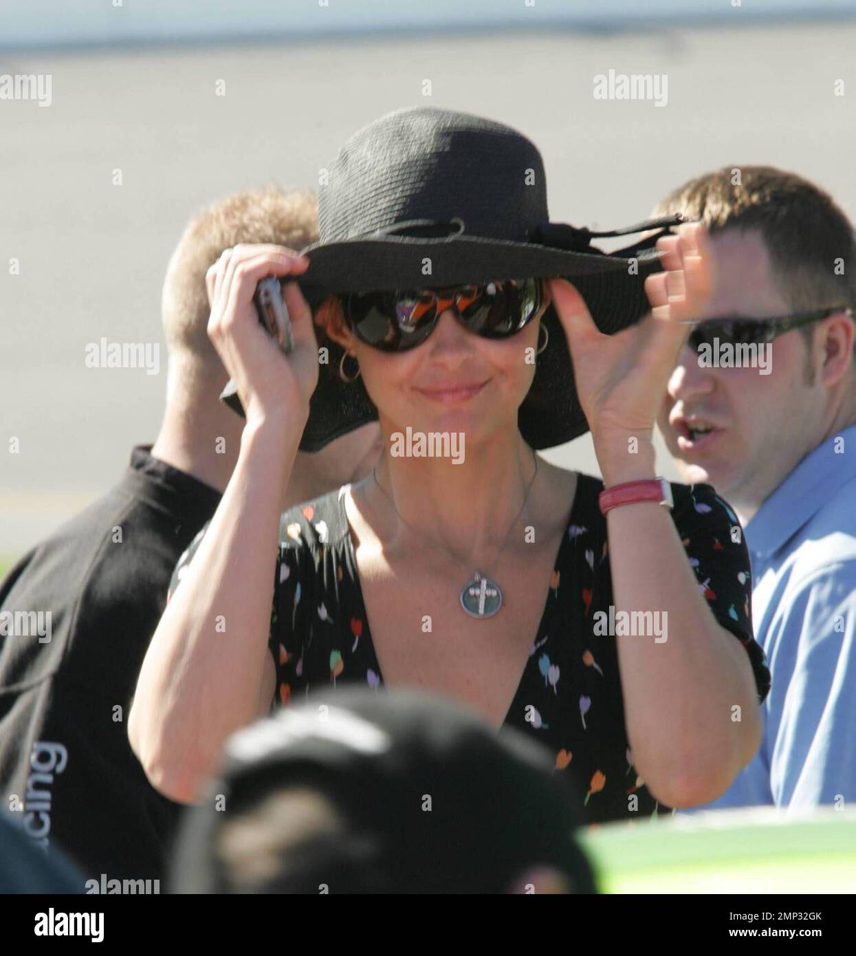 Actress Ashley Judd hid from the Florida sun under a floppy hat as she ...