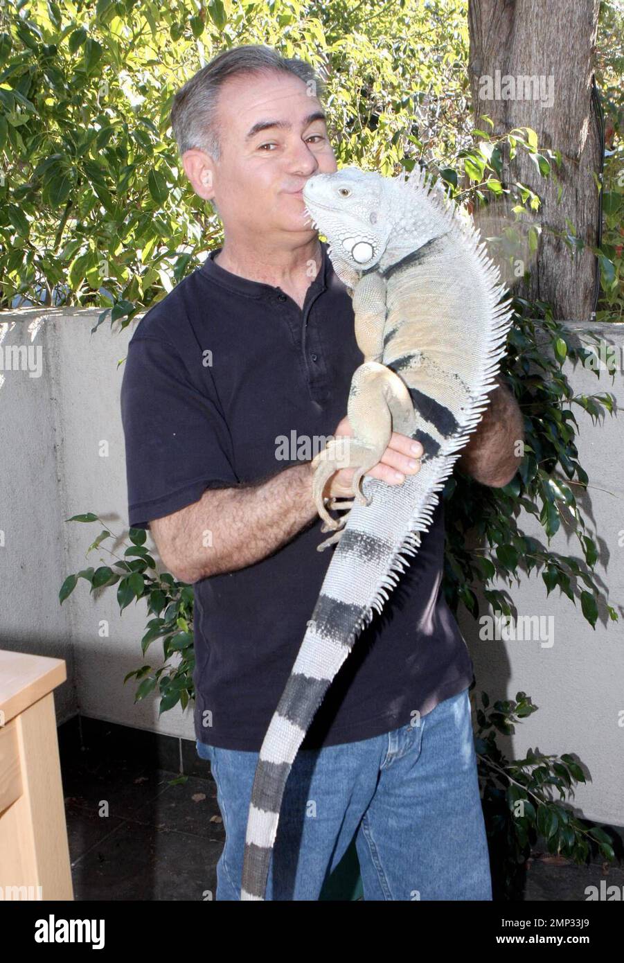 Exclusive!! Henry Lizardlover snuggles up with some of his lizard ...