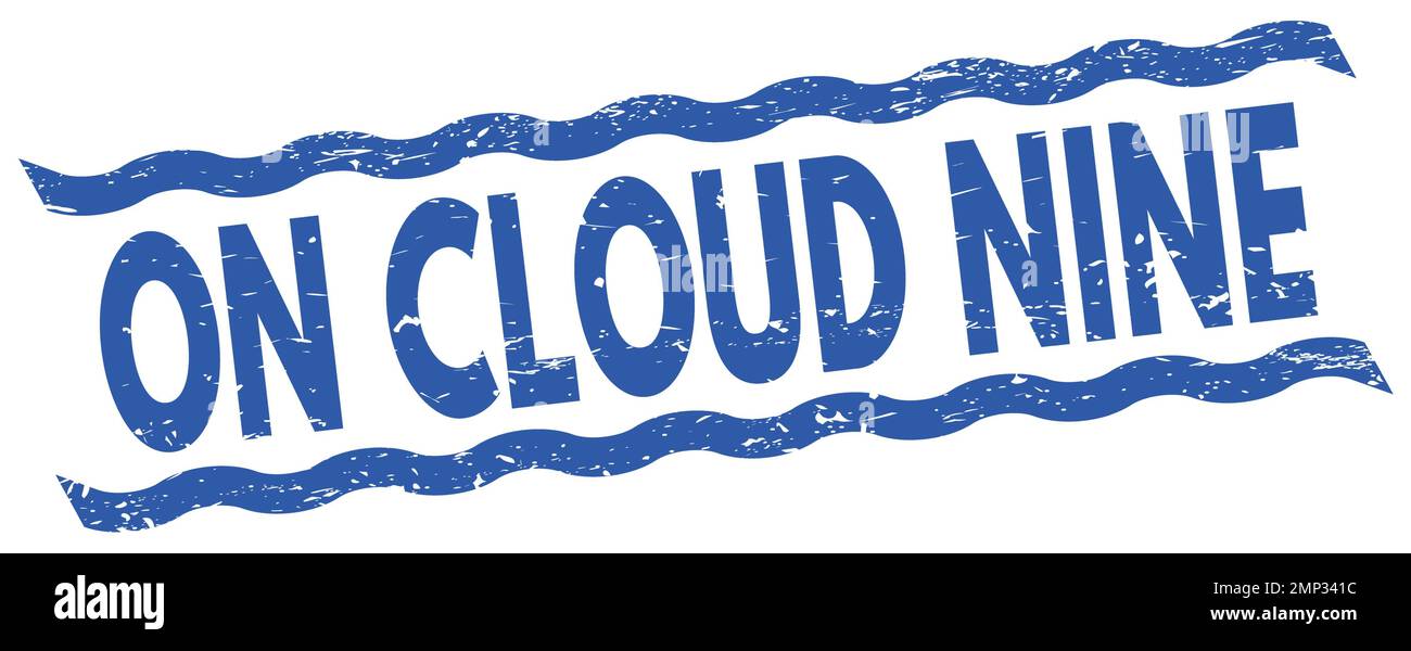 ON CLOUD NINE text written on blue lines stamp sign Stock Photo - Alamy