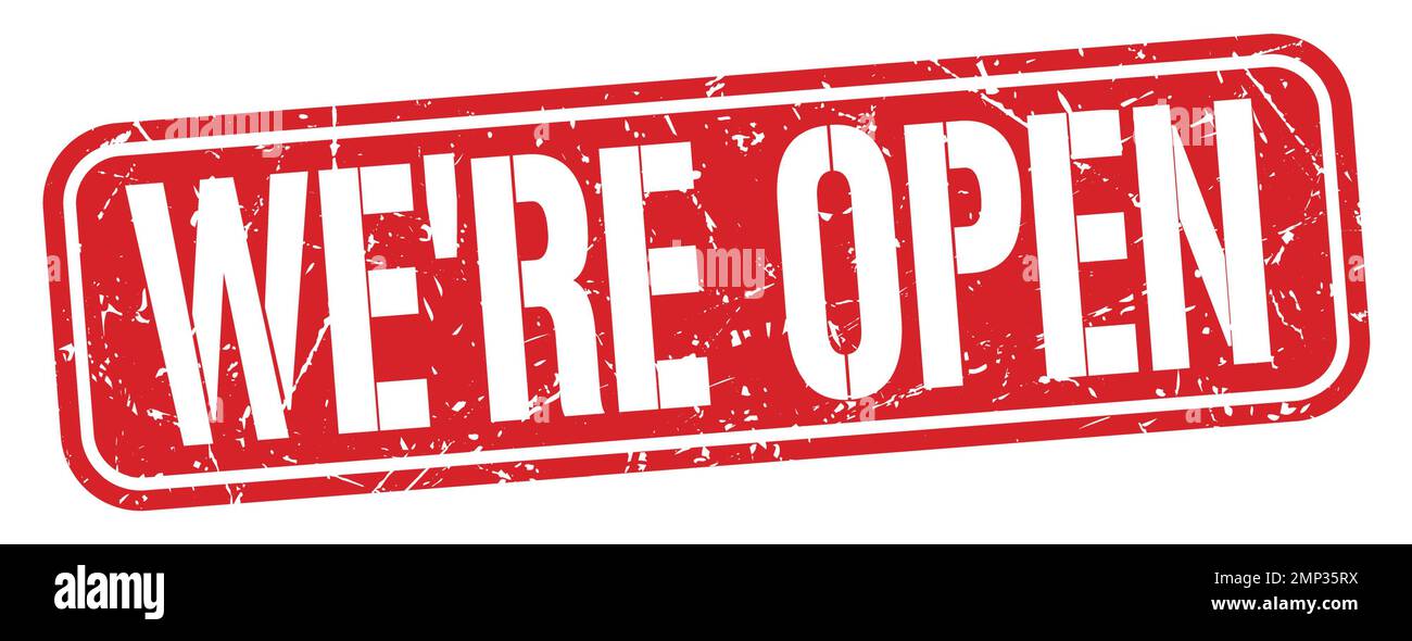 WE'RE OPEN text written on red grungy stamp sign Stock Photo - Alamy