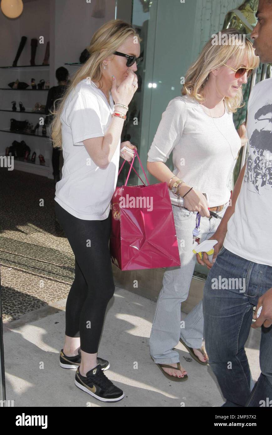Lindsay Lohan sports a set of colorful nails during a shopping spree at ...