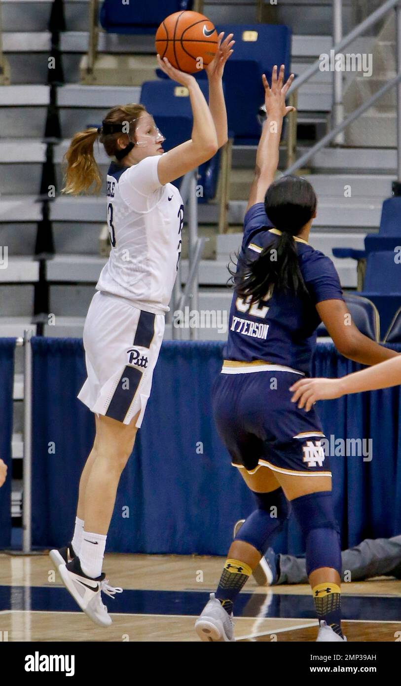 Pittsburgh's Alayna Gribble, left, shoots for three points as Notre ...