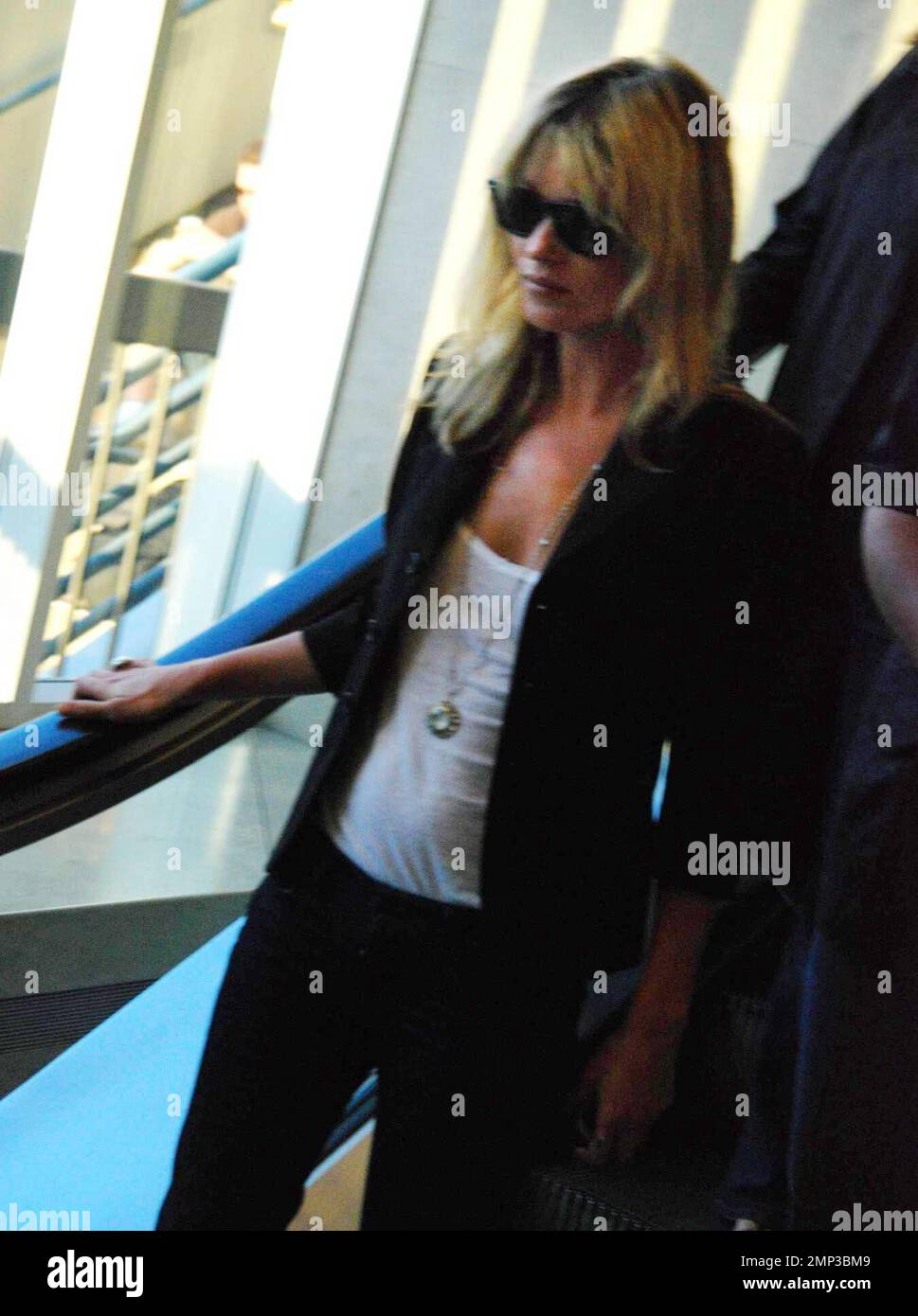 Super model Kate Moss makes her way through LAX after a quick trip to ...