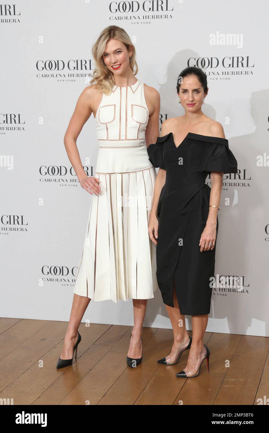 Model Karlie Kloss, left, and Carolina Herrera pose for photographers ...