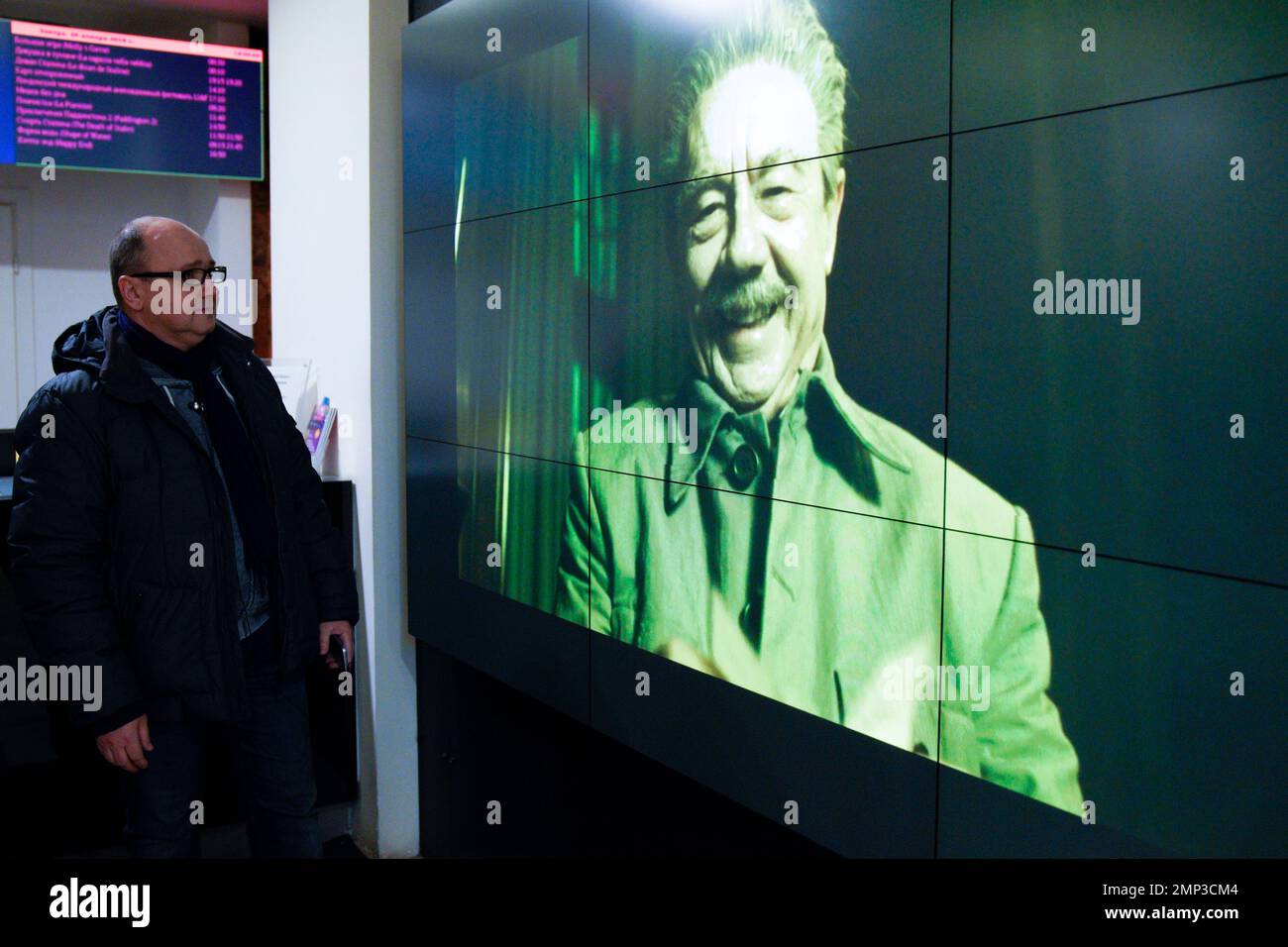 A screen in Pioner movie theater shows an episode with actor Adrian ...