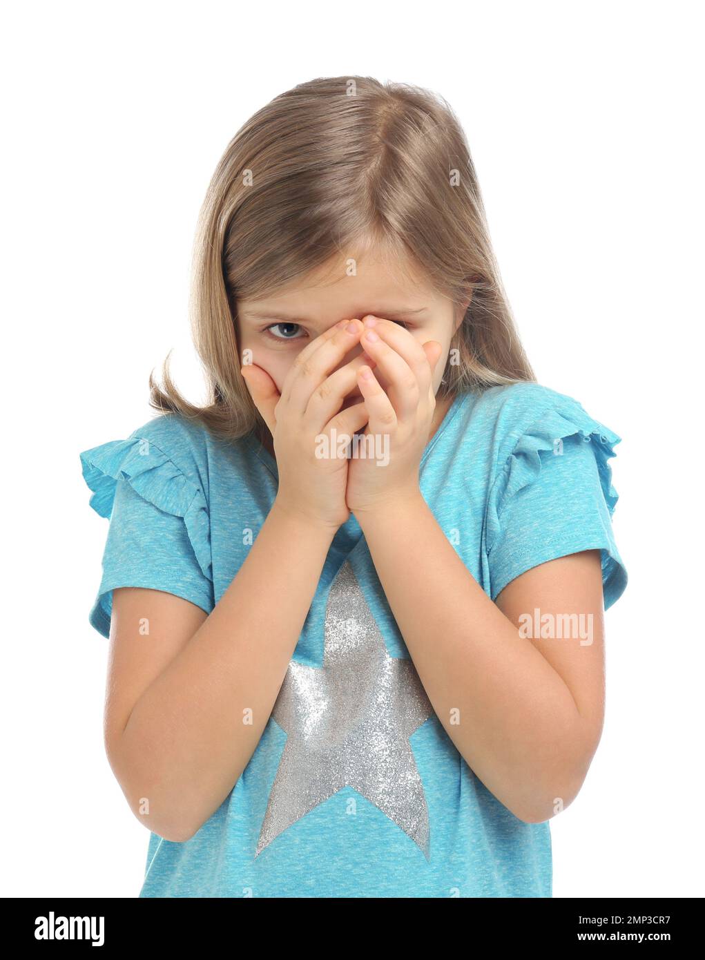 Scared little girl wearing casual outfit on white background Stock ...