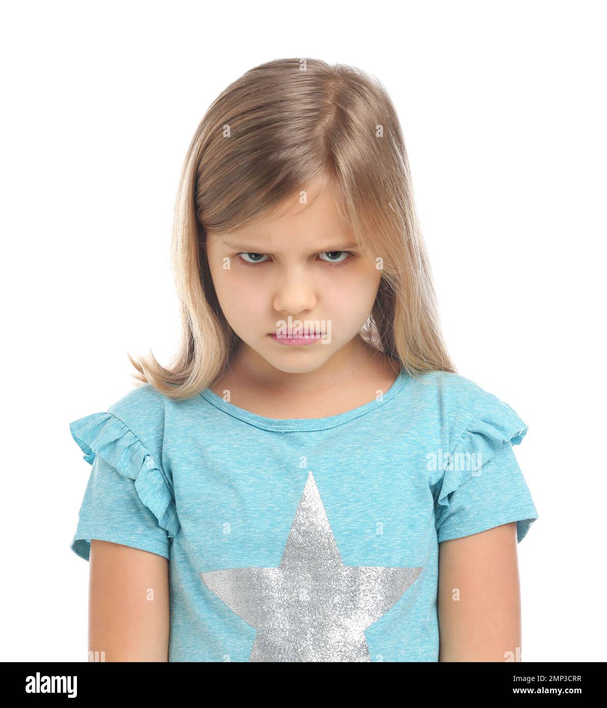 Angry little girl in casual outfit on white background Stock Photo - Alamy