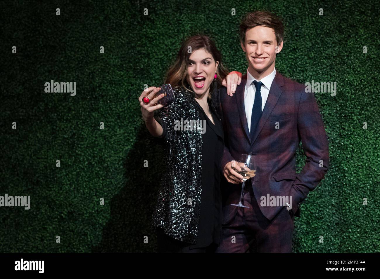 Madame Tussauds worker Carlotta Morelli, left, poses with the new wax ...