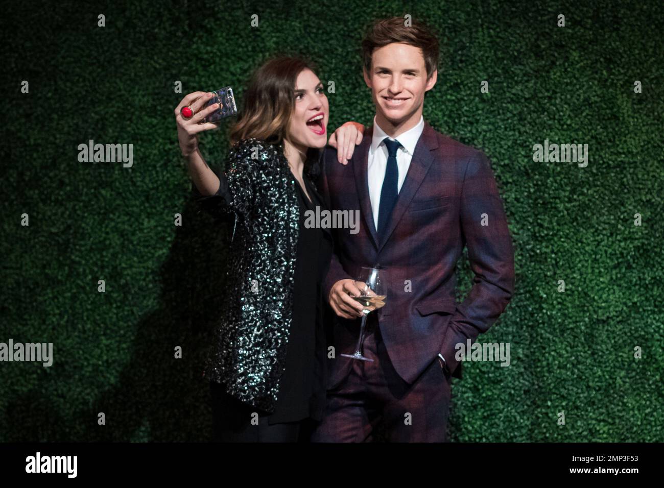 Madame Tussauds worker Carlotta Morelli, left, poses with the new wax ...