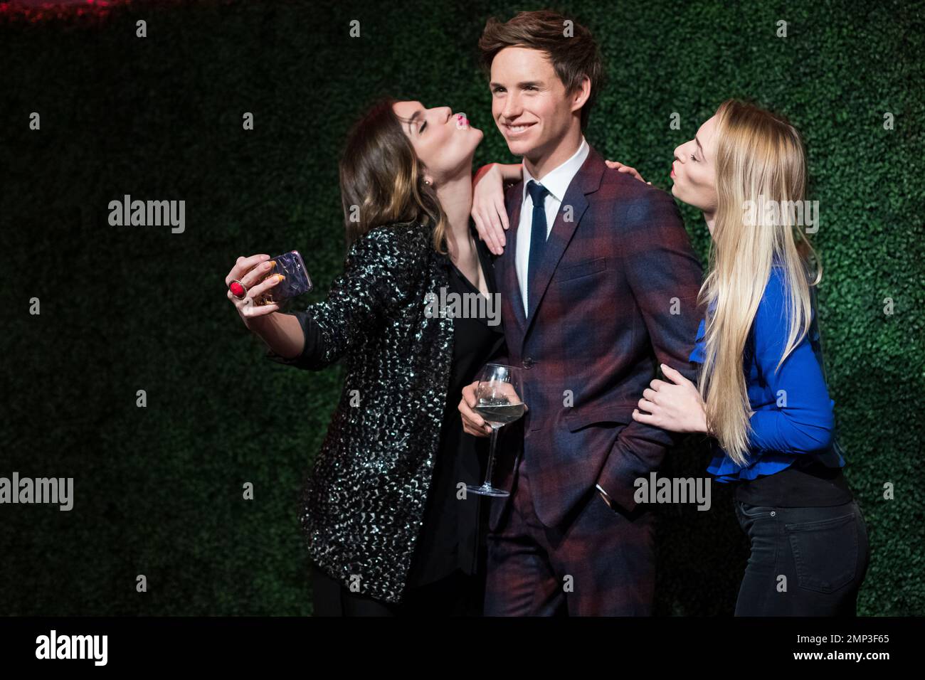 Madame Tussauds workers Carlotta Morelli, left, and Sasha Betty pose ...