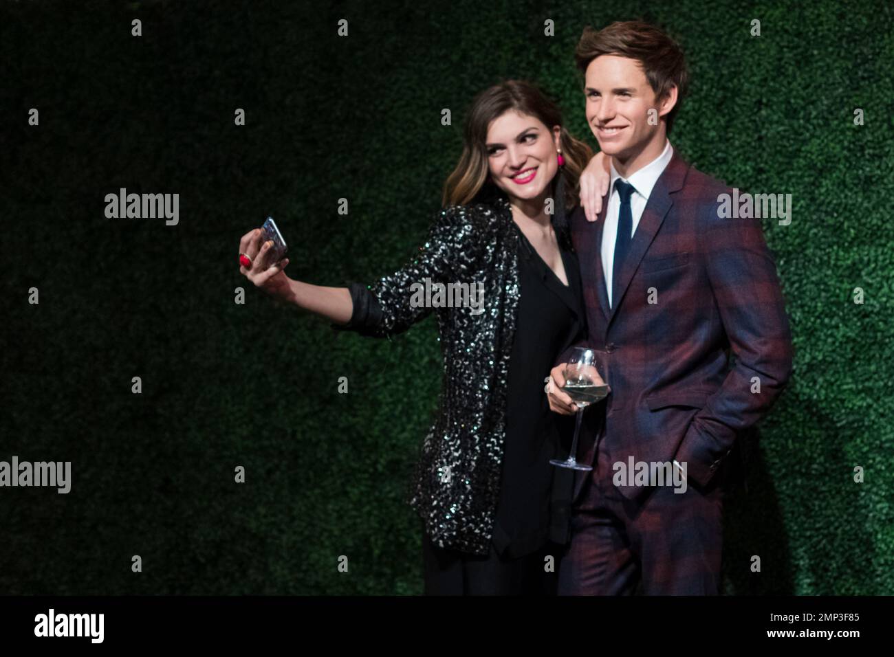 Madame Tussauds worker Carlotta Morelli, left, poses with the new wax ...