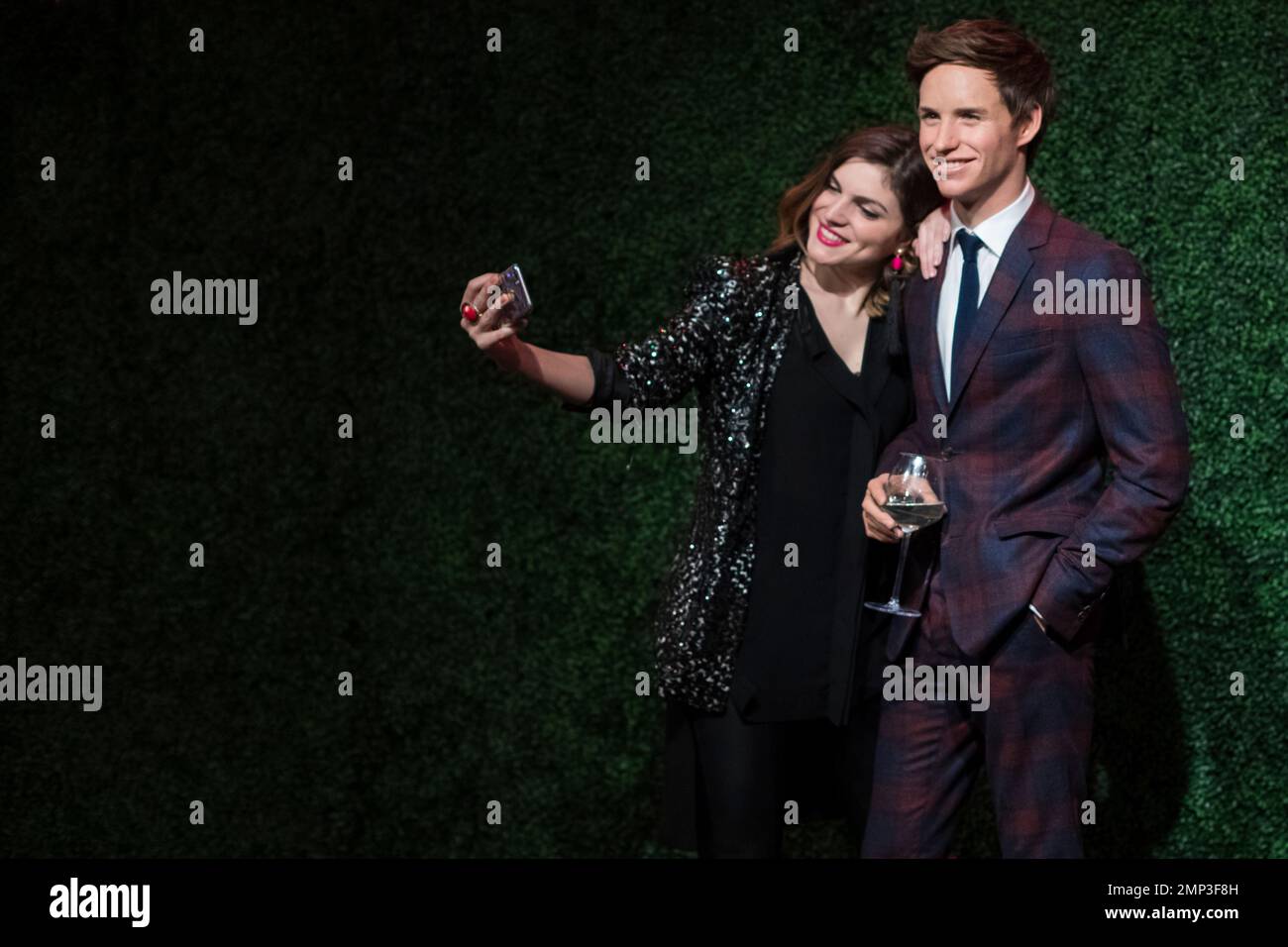 Madame Tussauds worker Carlotta Morelli, left, poses with the new wax ...