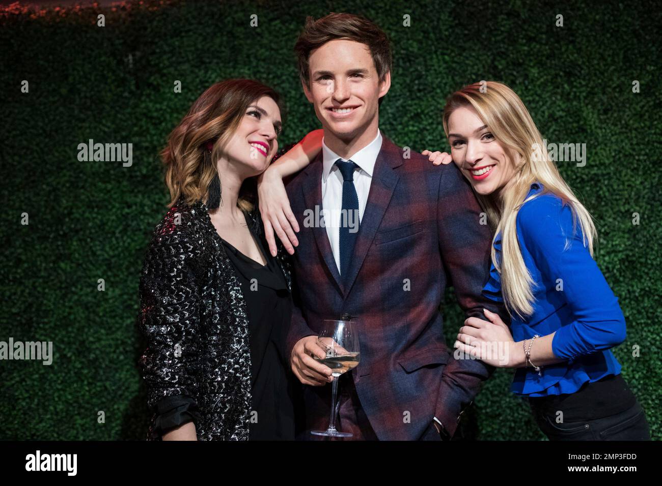 Madame Tussauds workers Carlotta Morelli, left, and Sasha Betty pose ...