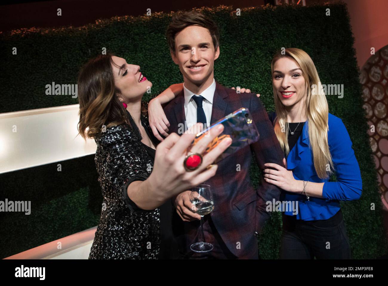 Madame Tussauds workers Carlotta Morelli, left, and Sasha Betty pose ...