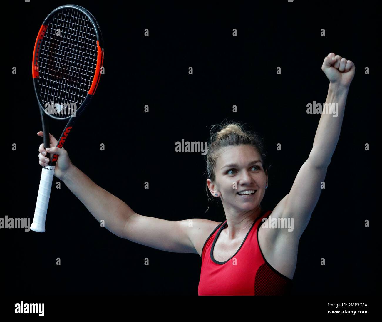 Romania's Simona Halep celebrates after defeating Germany's Angelique ...