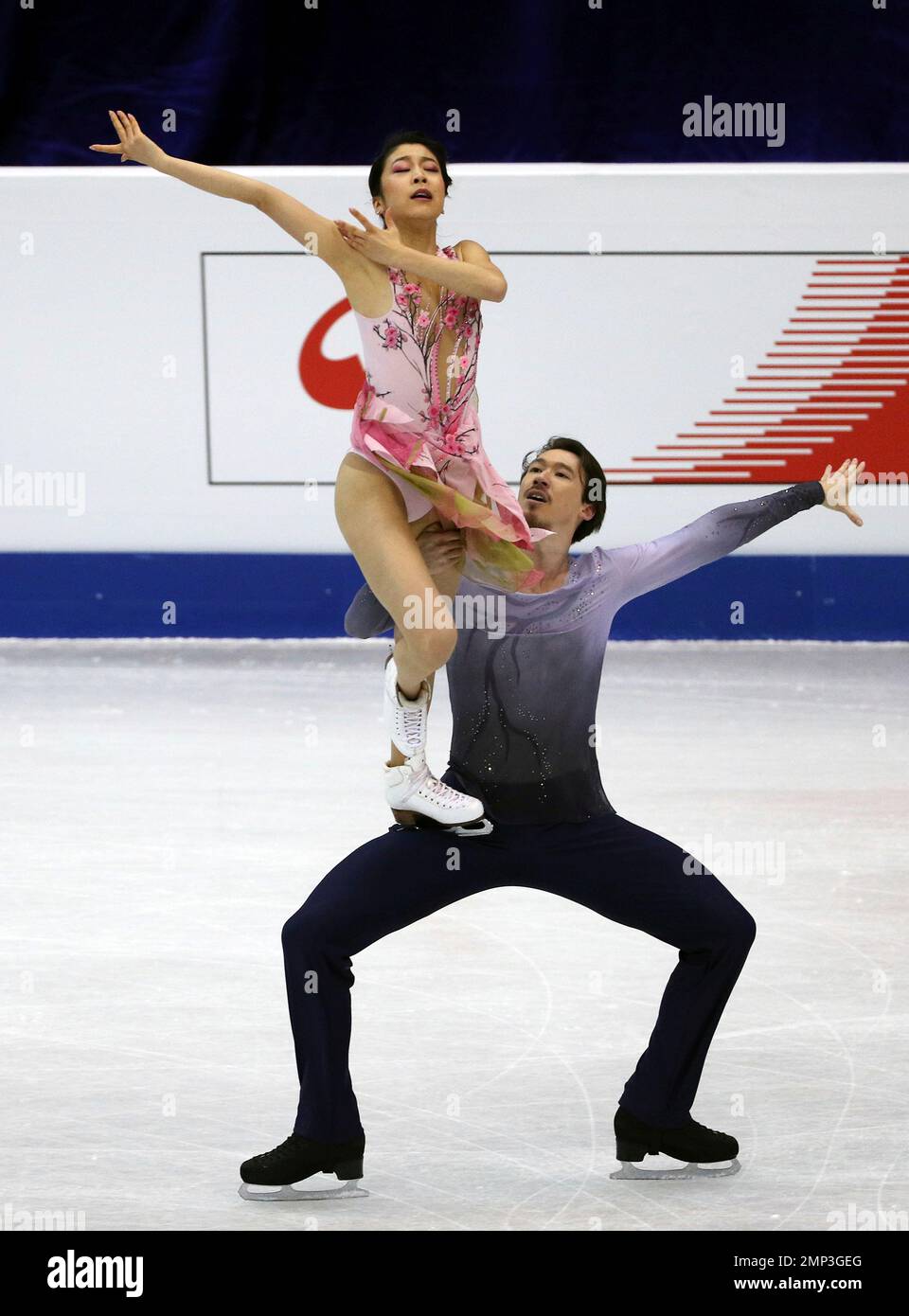 Kana Muramoto and Chris Reed of Japan perform their free program in the ...