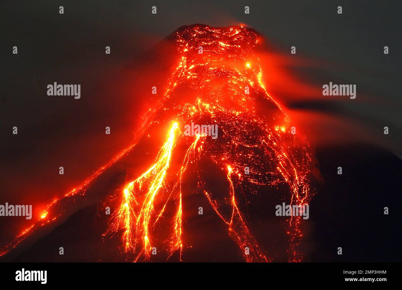 Mayon volcano spews molten lava during its sporadic eruption early ...
