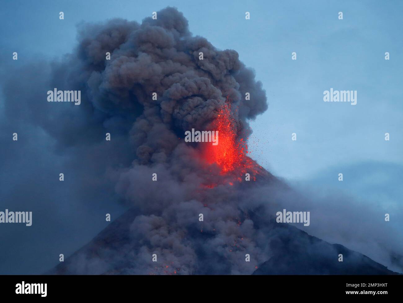 Mayon volcano spews molten lava during its sporadic eruption early ...