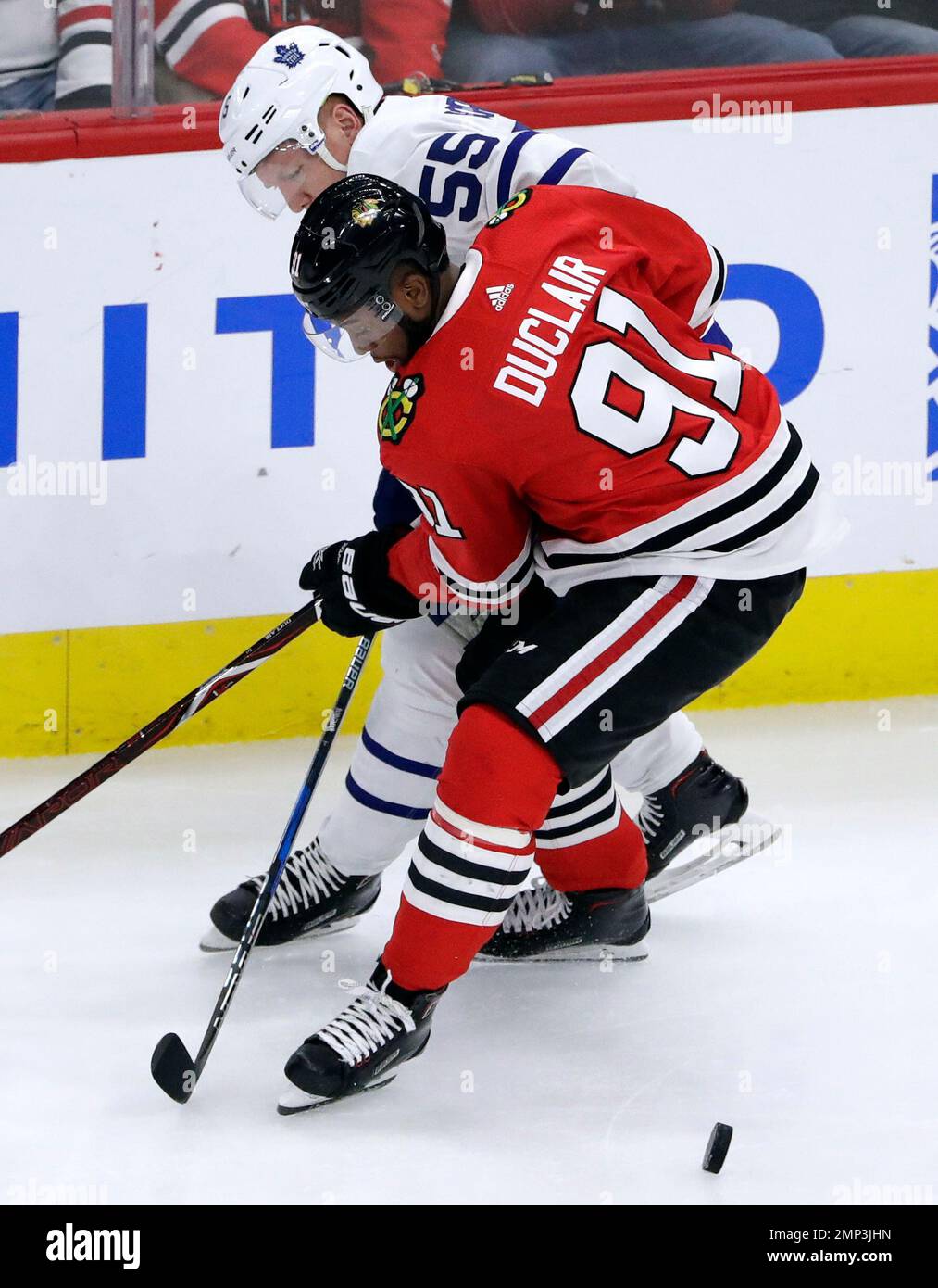 Toronto Maple Leafs defenseman Andreas Borgman, top, and Chicago ...