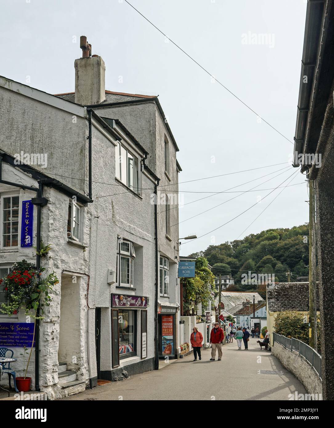 Shops on the Coombe in the picturesque Cornish village of Polperro. The ...