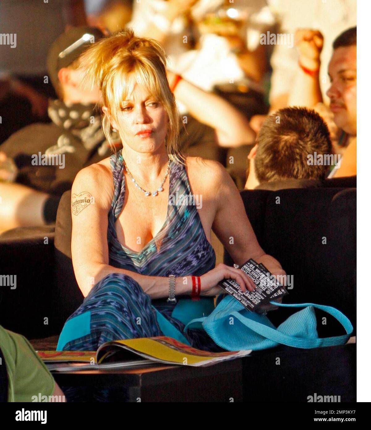 Melanie Griffith takes a smoke break whilst enjoying the Coachella Music Festival in Indio, CA ...