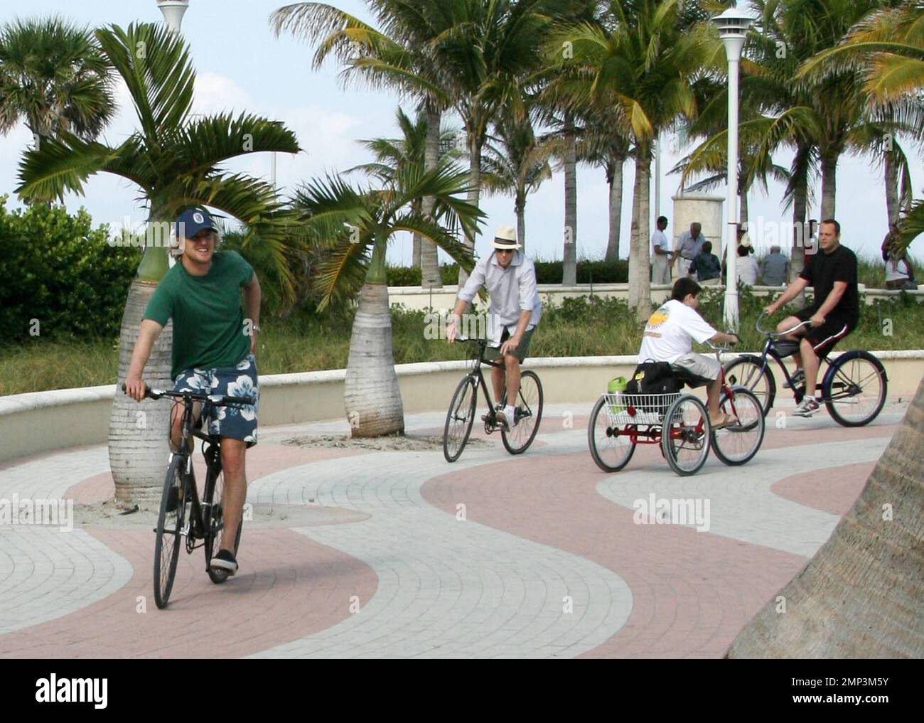 Exclusive!! Owen Wilson and Vince Vaughn take a Sunday afternoon bike ride along the Miami Beach ...