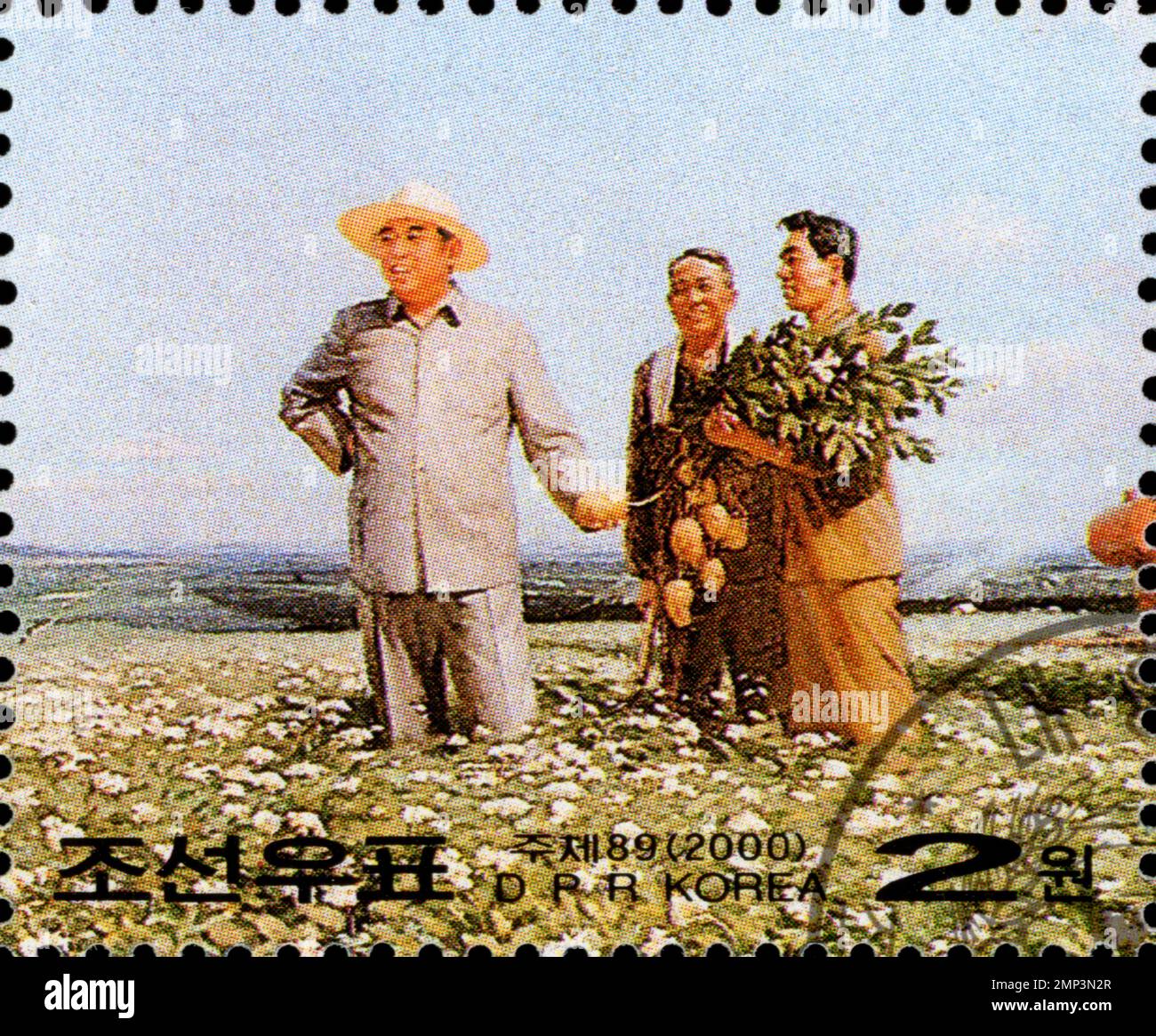North Korean postage stamp from 2000 featuring Kim Il-sung with farmers ...