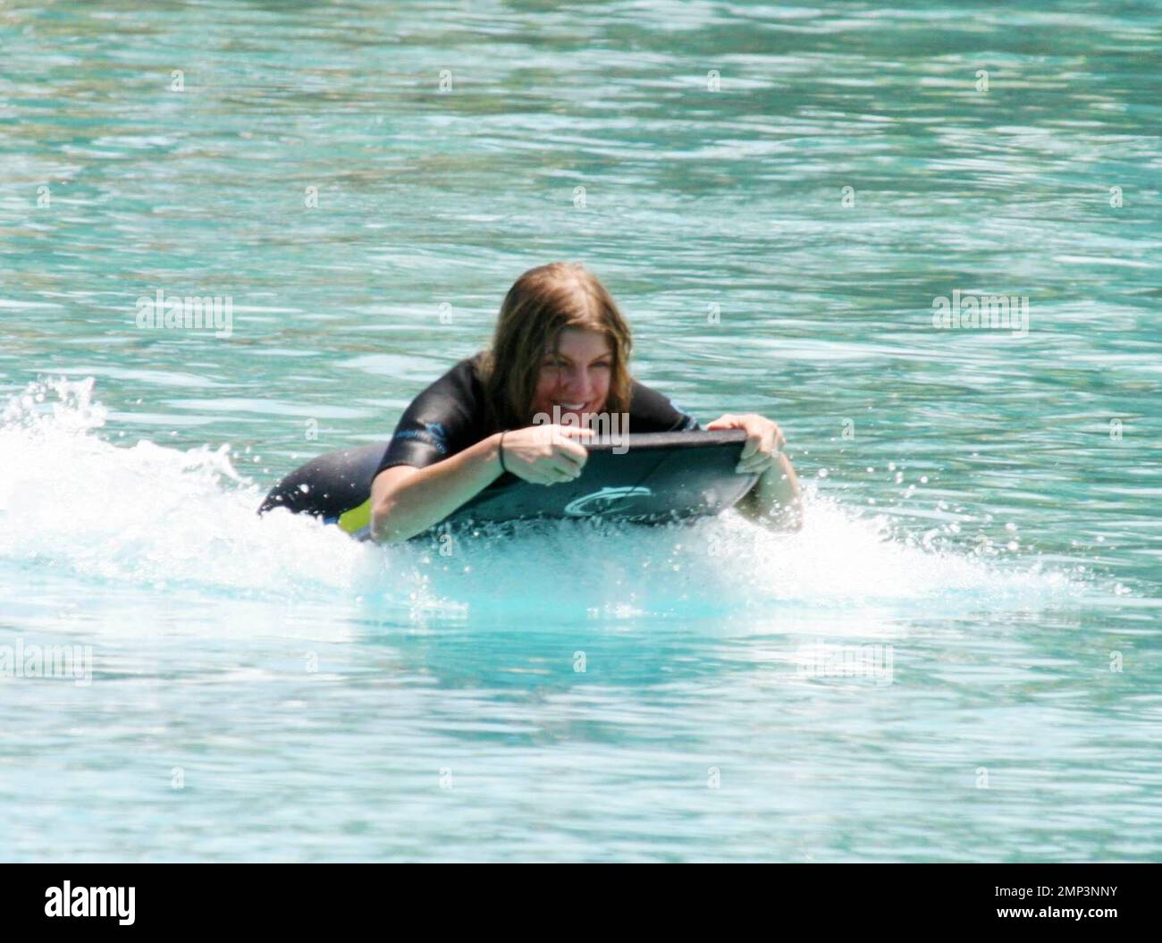 Exclusive!! Fergie goes for a dolphin experience at Atlantis Resort in ...