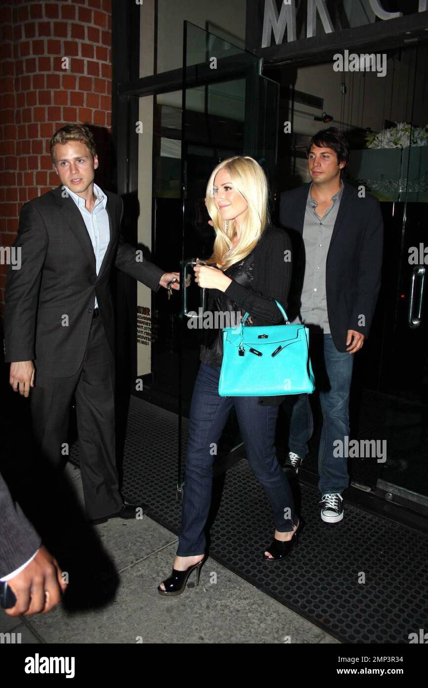 Heidi Montag signs autographs, including one for a soldier, as she and ...