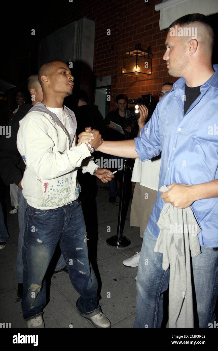 Rapper Ti leaves Mr. Chow and signs autographs and hugs a soldier on ...