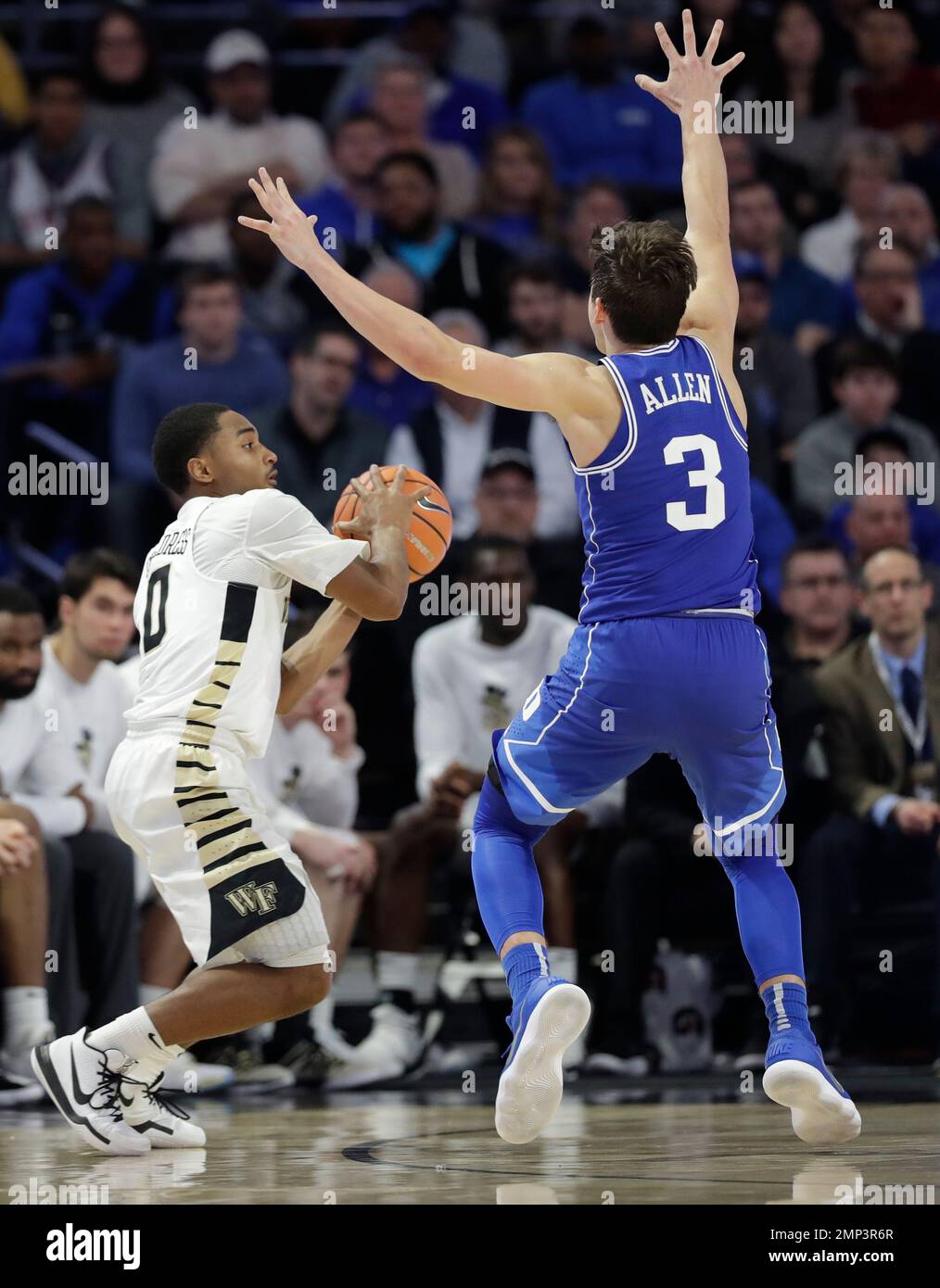 Wake Forest's Brandon Childress (0) is guarded by Duke's Grayson Allen ...