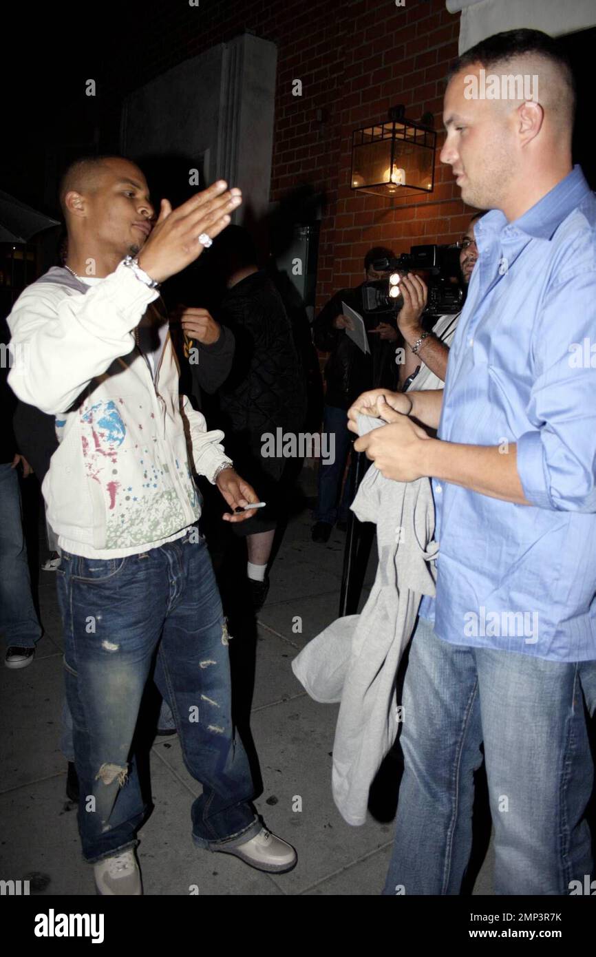 Rapper Ti leaves Mr. Chow and signs autographs and hugs a soldier on ...
