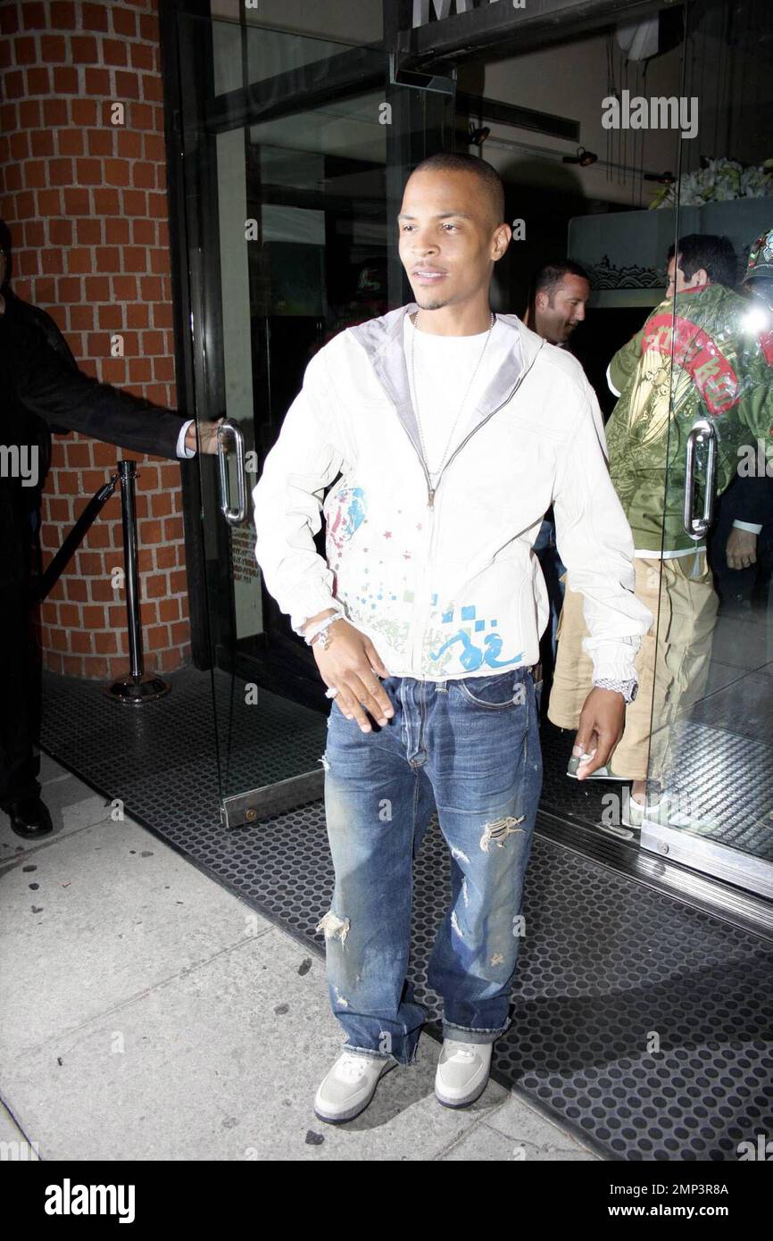 Rapper Ti leaves Mr. Chow and signs autographs and hugs a soldier on ...