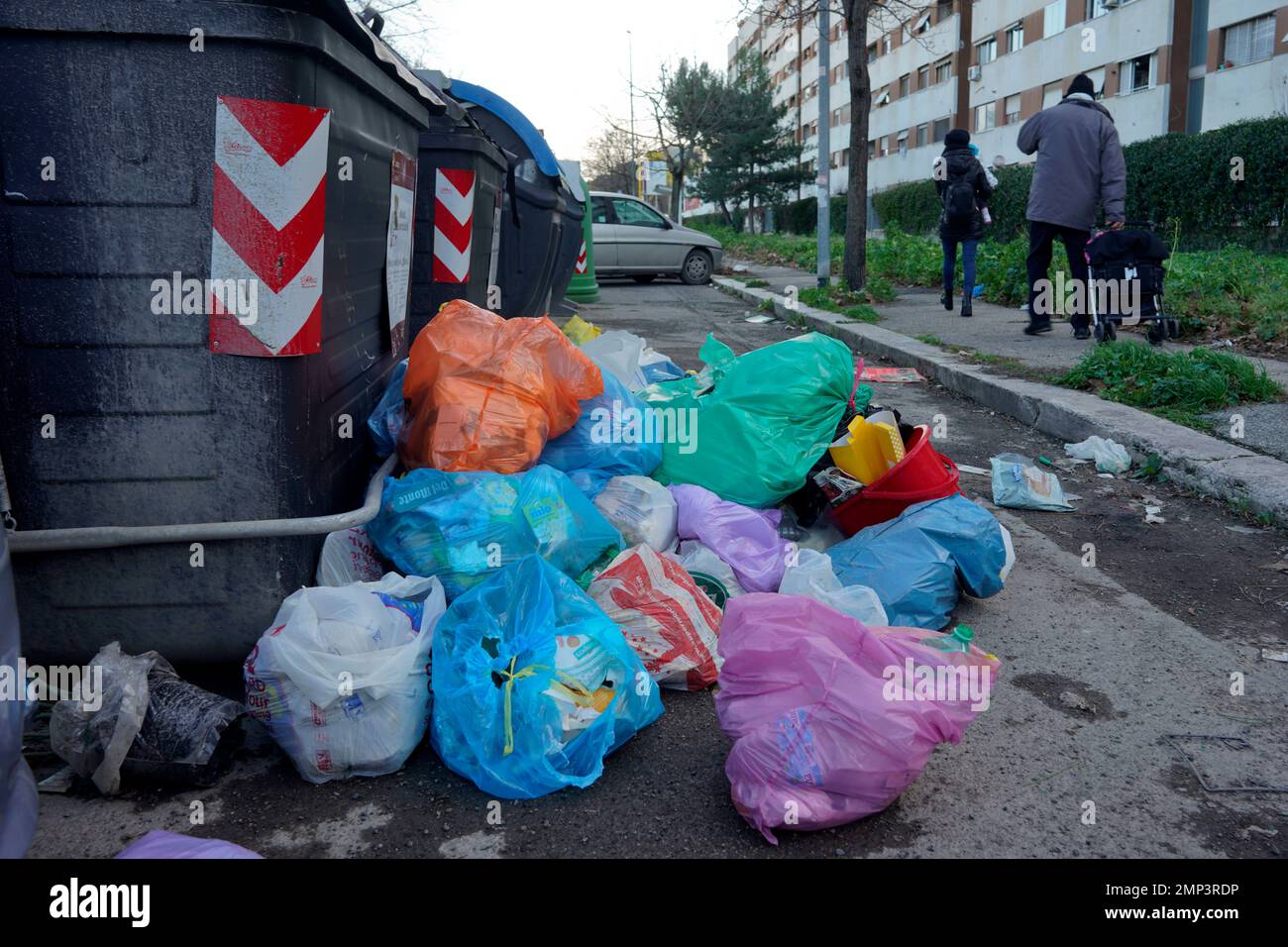 Trash surrounds garbage bins, in Rome, in this photo taken on Wednesday ...