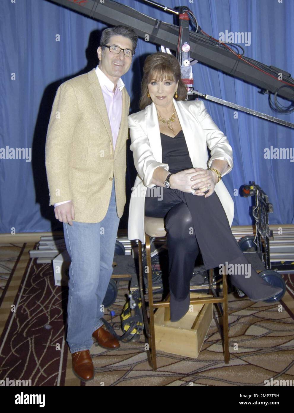 Jeffrey Pollack and Jackie Collins pose at the World Series of Poker ...
