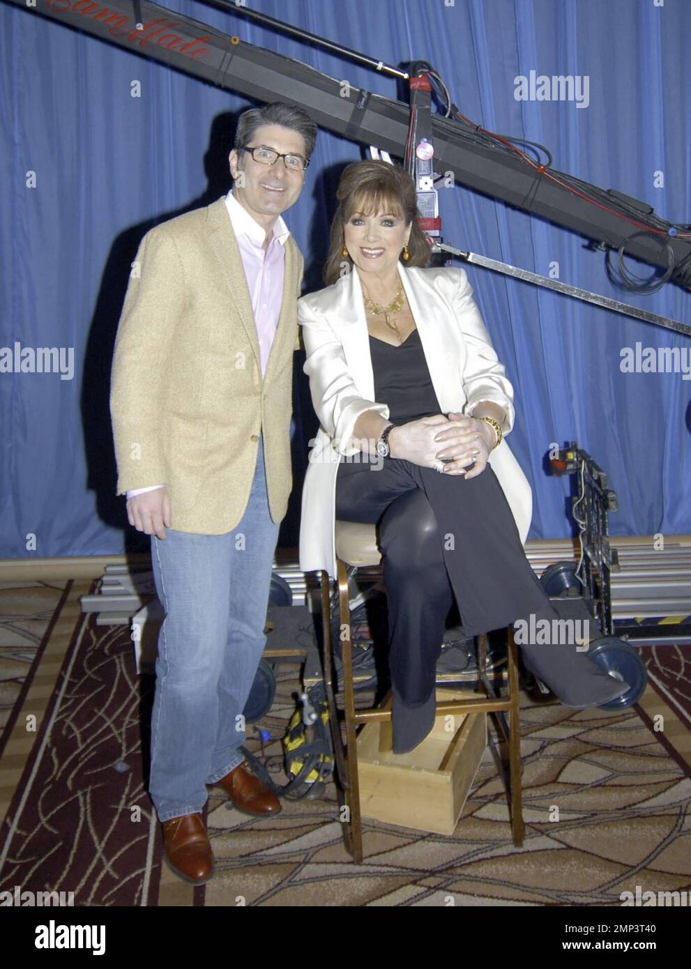 Jeffrey Pollack and Jackie Collins pose at the World Series of Poker ...