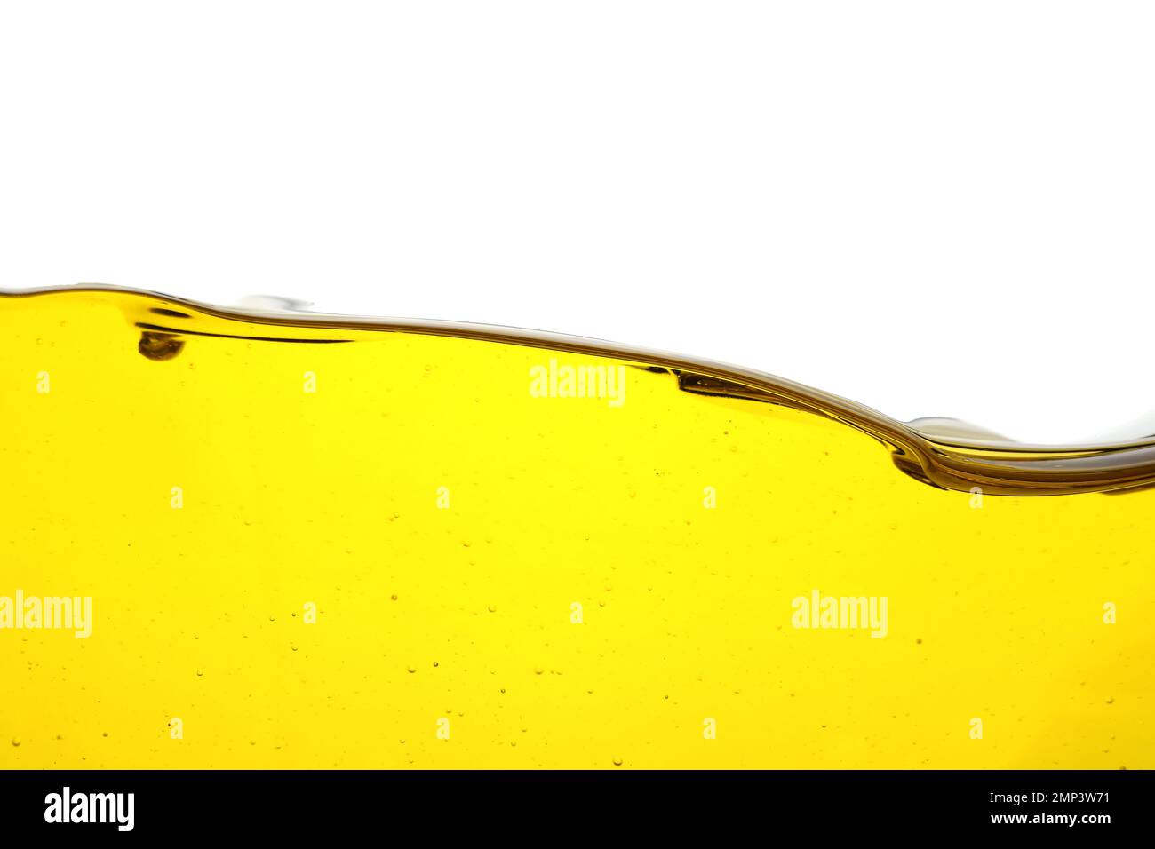 Cooking oil flow isolated on white. Color liquid Stock Photo - Alamy
