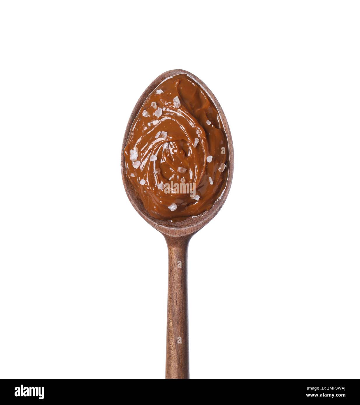 Salted caramel in spoon isolated on white Stock Photo - Alamy