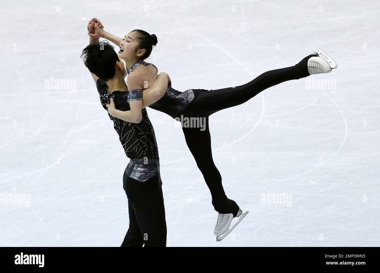 Ryom Tae Ok and Kim Ju Sik of North Korea perform their short program ...
