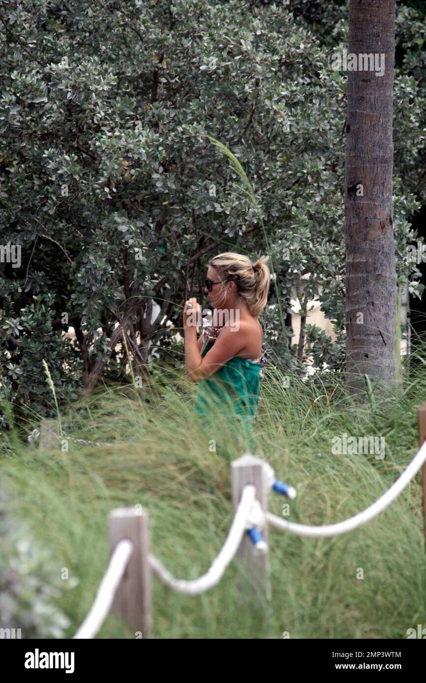 Steven Gerrard, Alex Curran and friends take a stroll on the beach ...