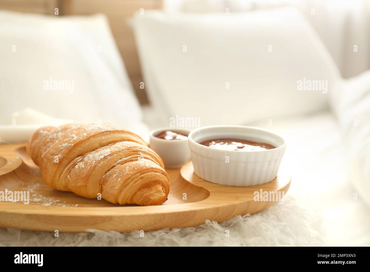 Delicious croissant and jam on tray. Delicious morning meal Stock Photo ...
