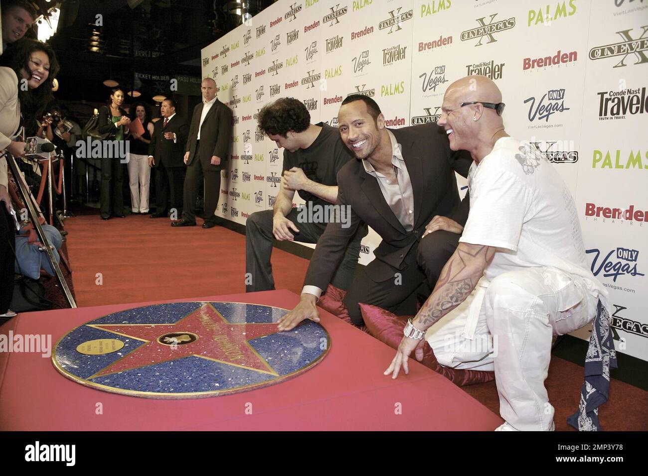George Maloof, Dwayne Johnson (aka The Rock) and Johnny Brenden attend ...