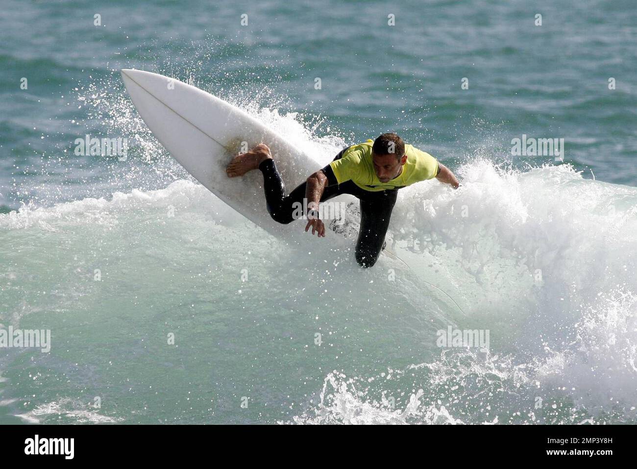 Surfers take part in the Oakley Gang Challenge surf contest at Santa ...