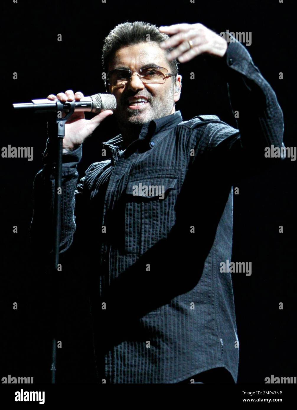 George Michael celebrates his 45th birthday by performing at the Forum ...