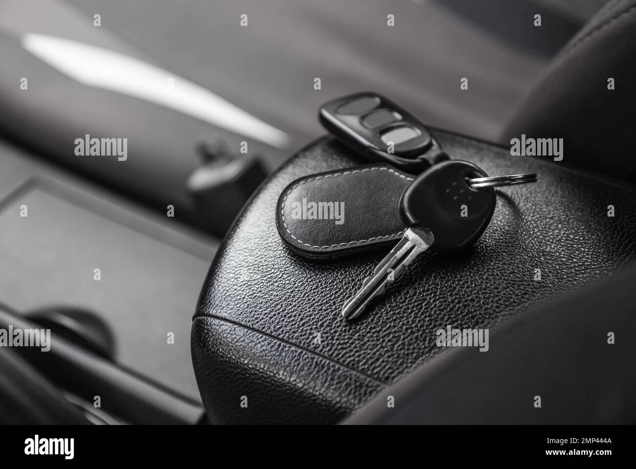 Key in new modern automobile. Car buying Stock Photo - Alamy