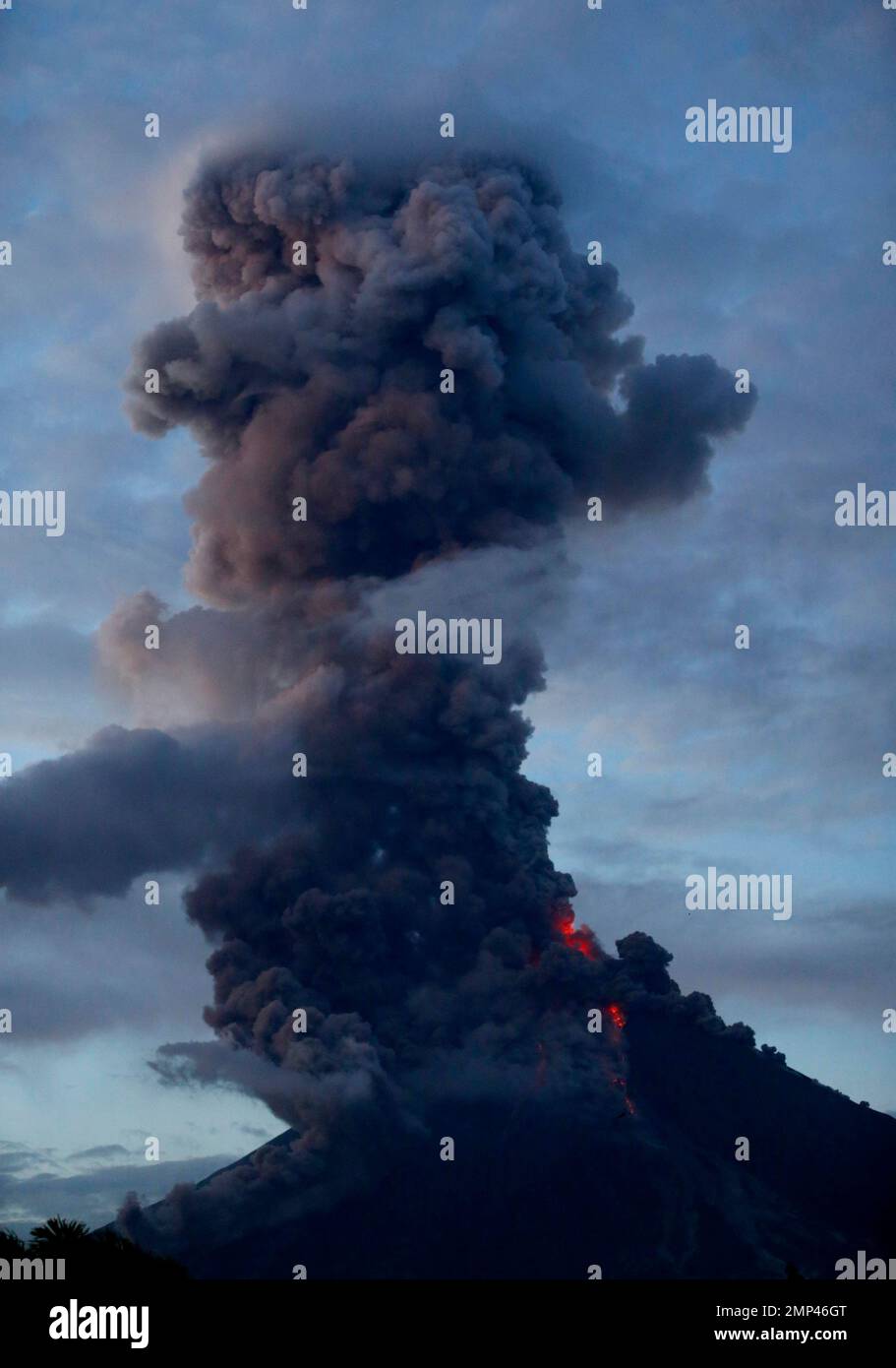 Mayon volcano spews red-hot lava in another eruption as seen from ...