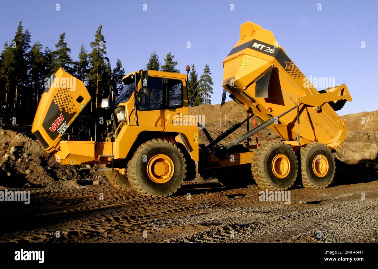 Different machines in a gravel pit. Here a Moxy MT 26 Highline dumper ...