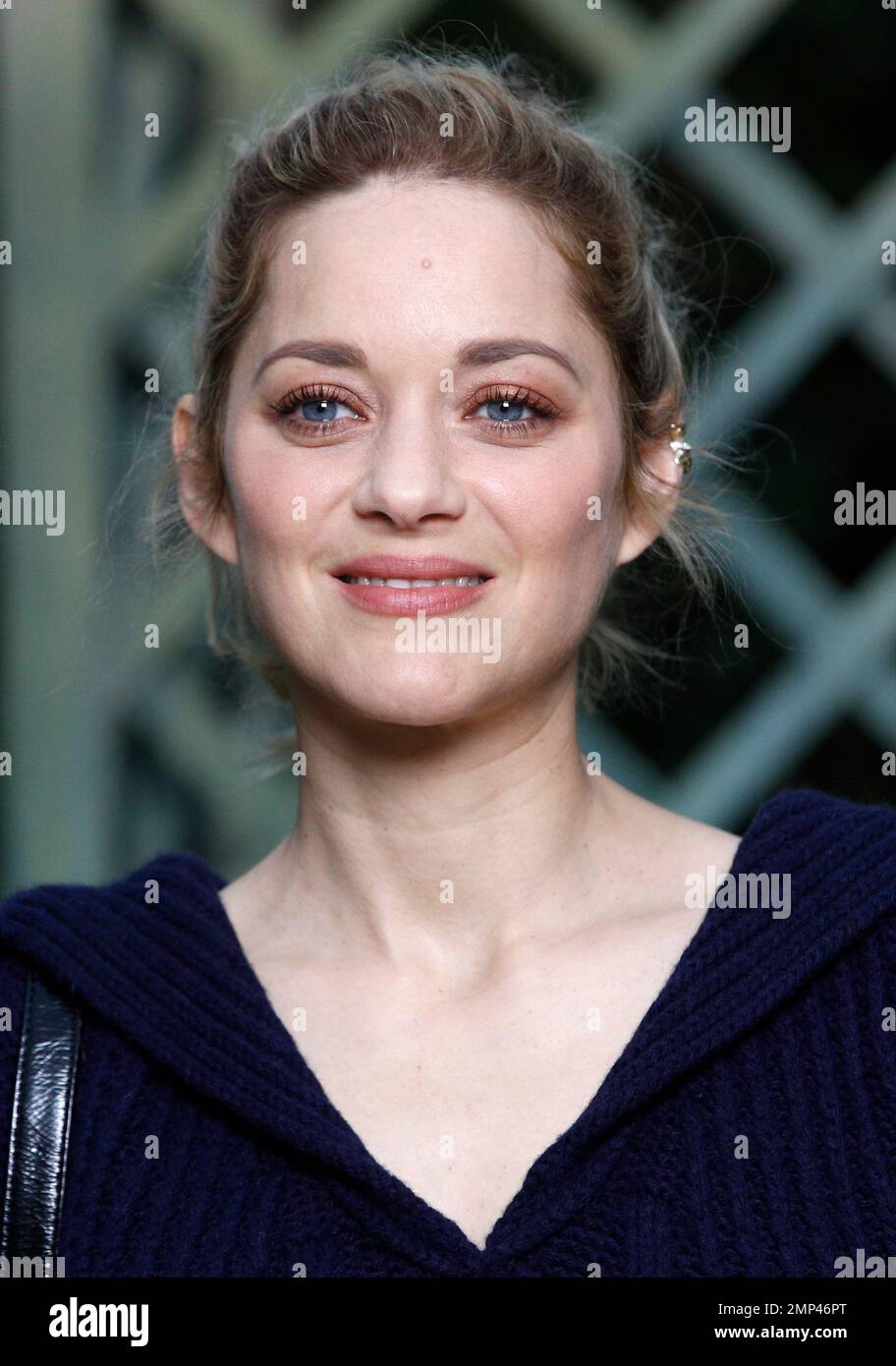 French actress Marion Cotillard poses during a photocall before Chanel ...