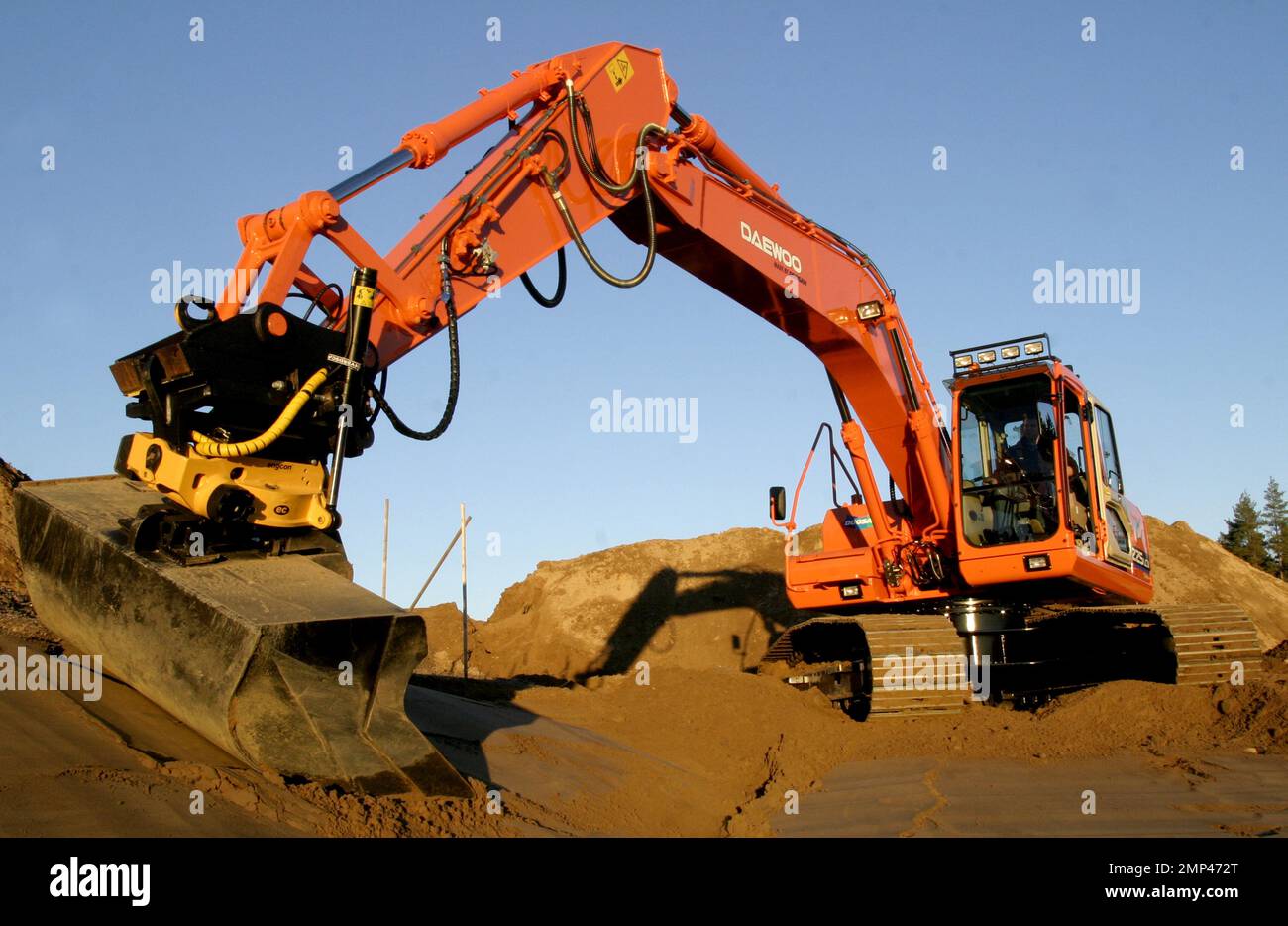 Different machines in a gravel pit. In the picture: Daewoo Doosan solar ...