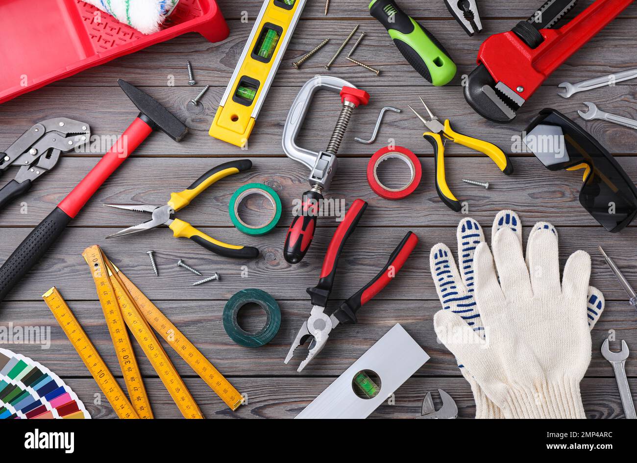 Flat lay composition with different construction tools on wooden ...
